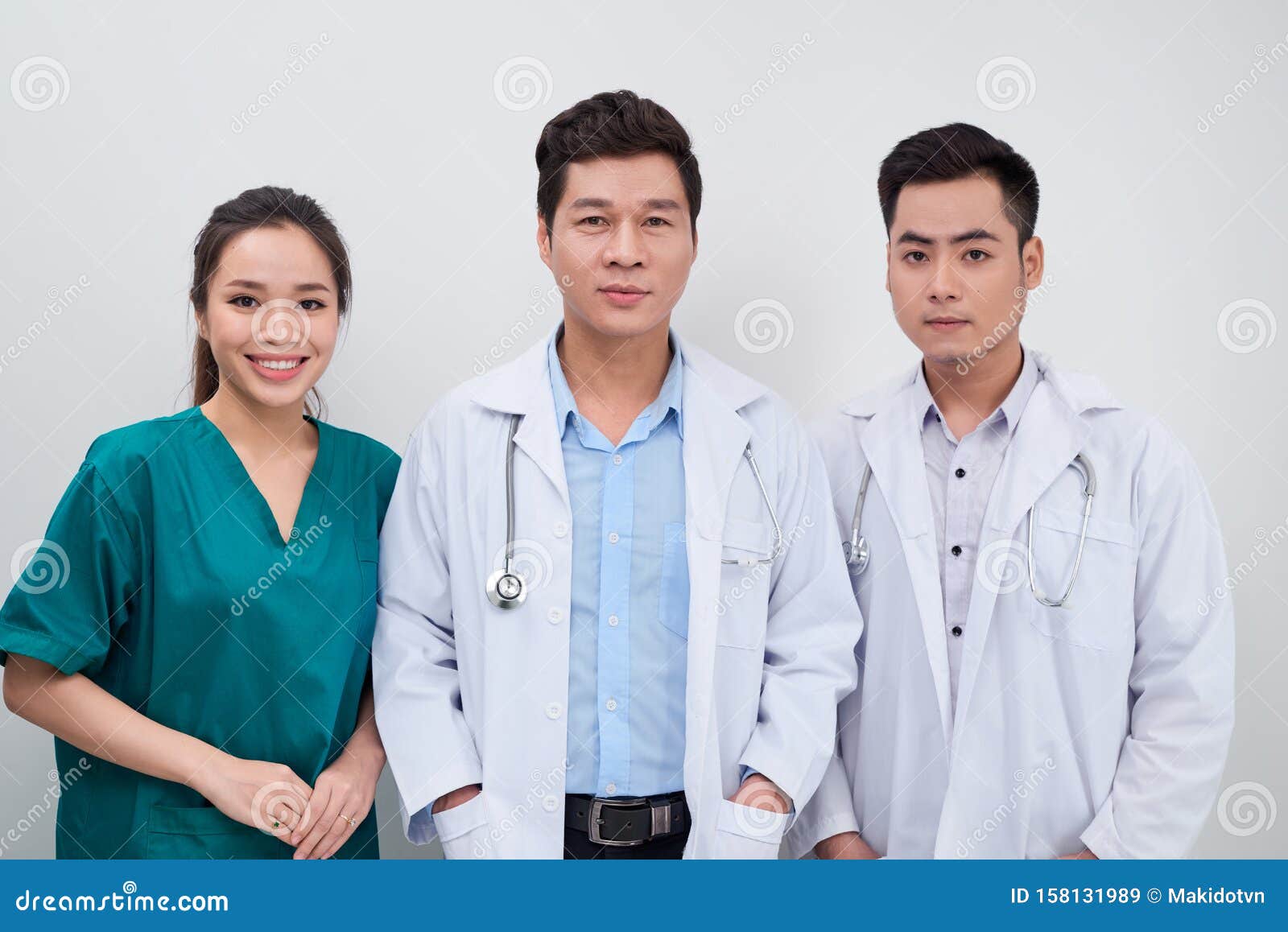 Group of Asian Medical Workers/ Doctors and Nurse Smiling at Camera ...