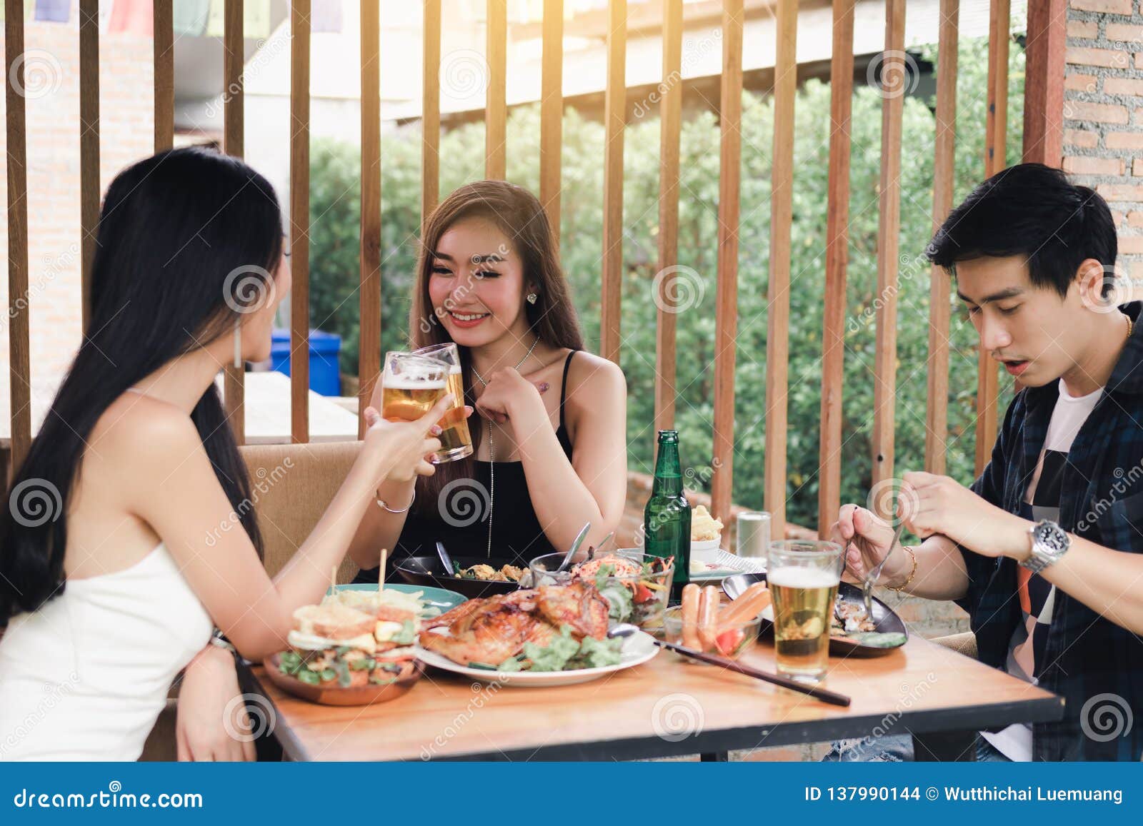 Group of Asian People Cheering Beer at Restaurant Happy Hour in ...