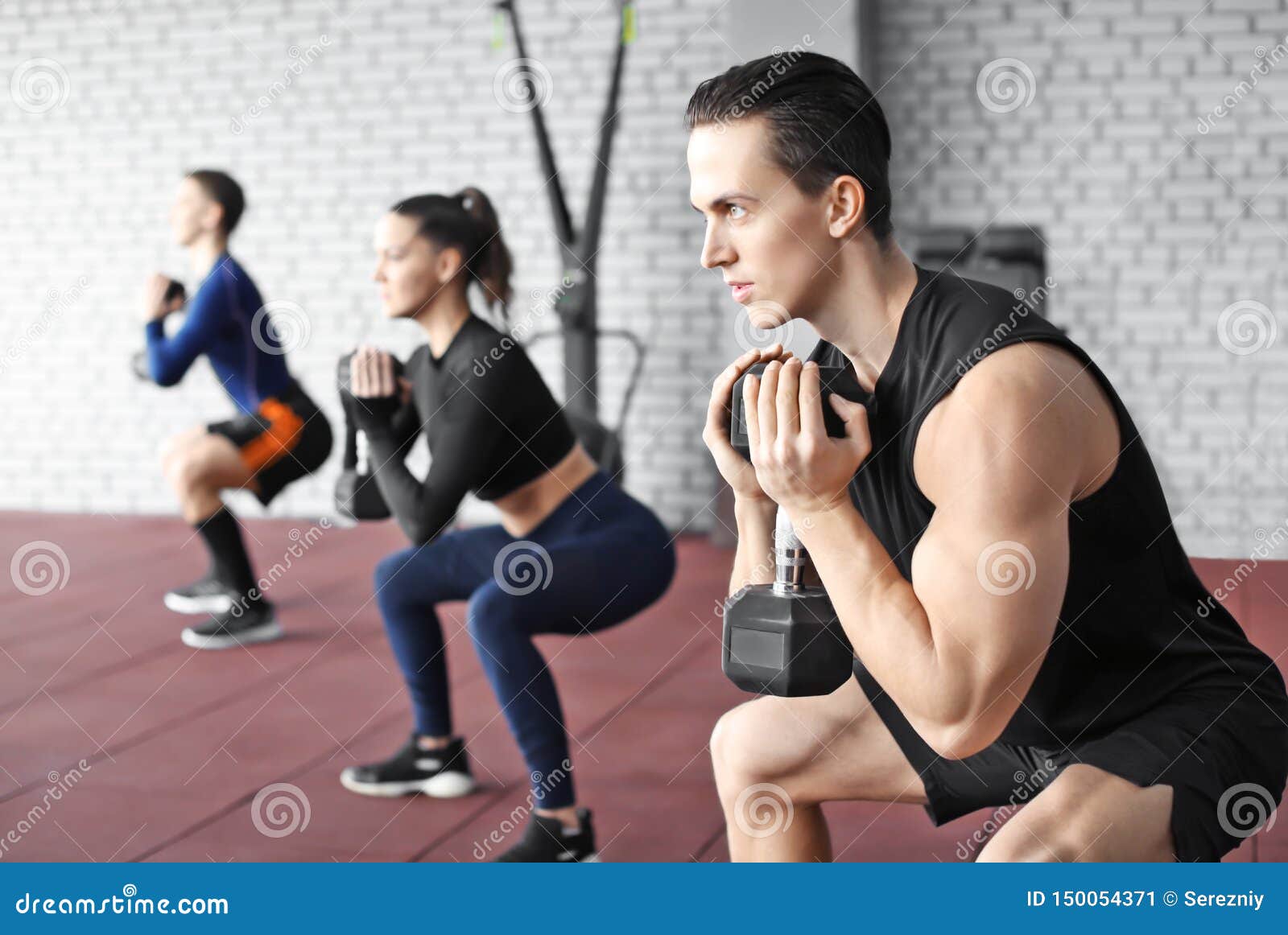 Group of Athletes Working Out in Gym Stock Image - Image of athletes ...