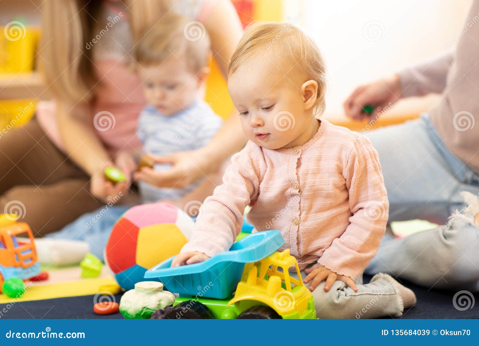 Group of Babies with Mothers at Playgroup Stock Image - Image of ...