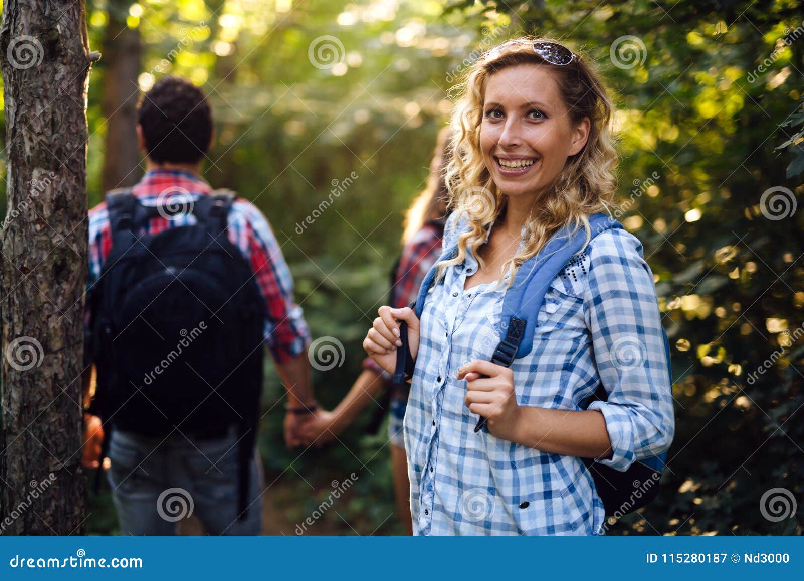 Group of Backpacking Hikers Going for Forest Trekking Stock Image ...