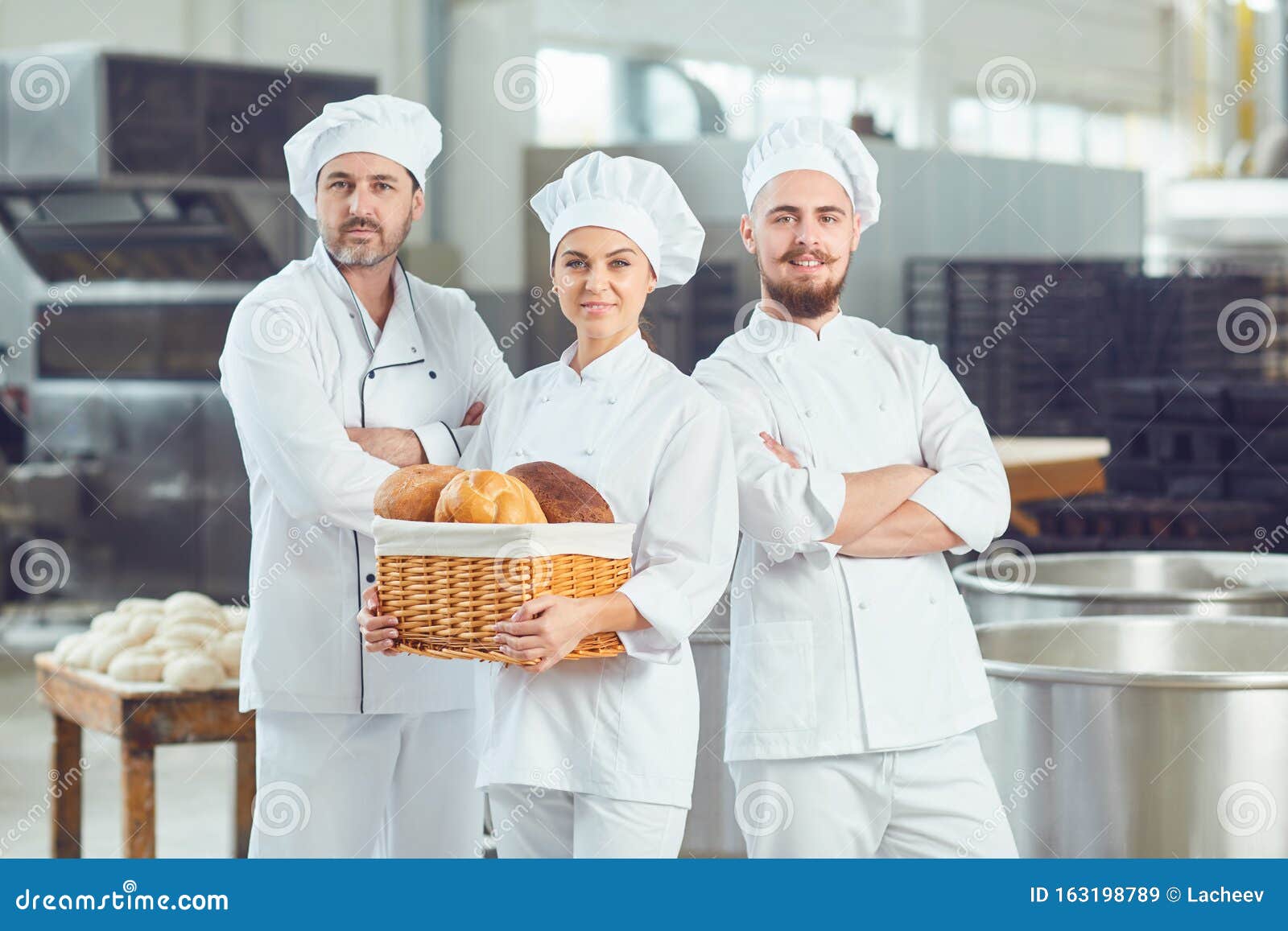 A Group of Bakers Smiles at the Bakery Stock Image - Image of kitchen ...