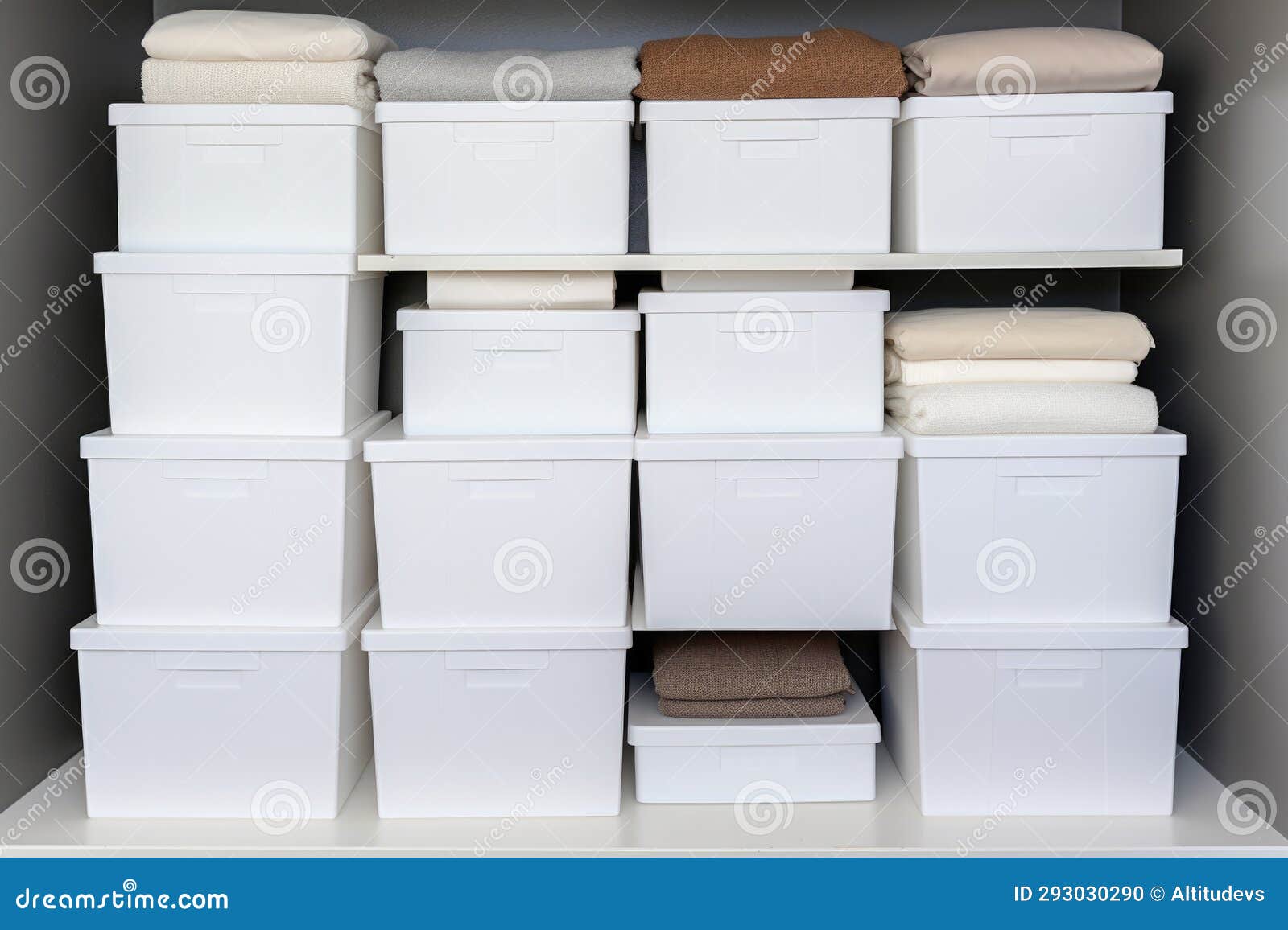 Group of Basic, White Storage Boxes Stacked in a Closet Stock Photo ...