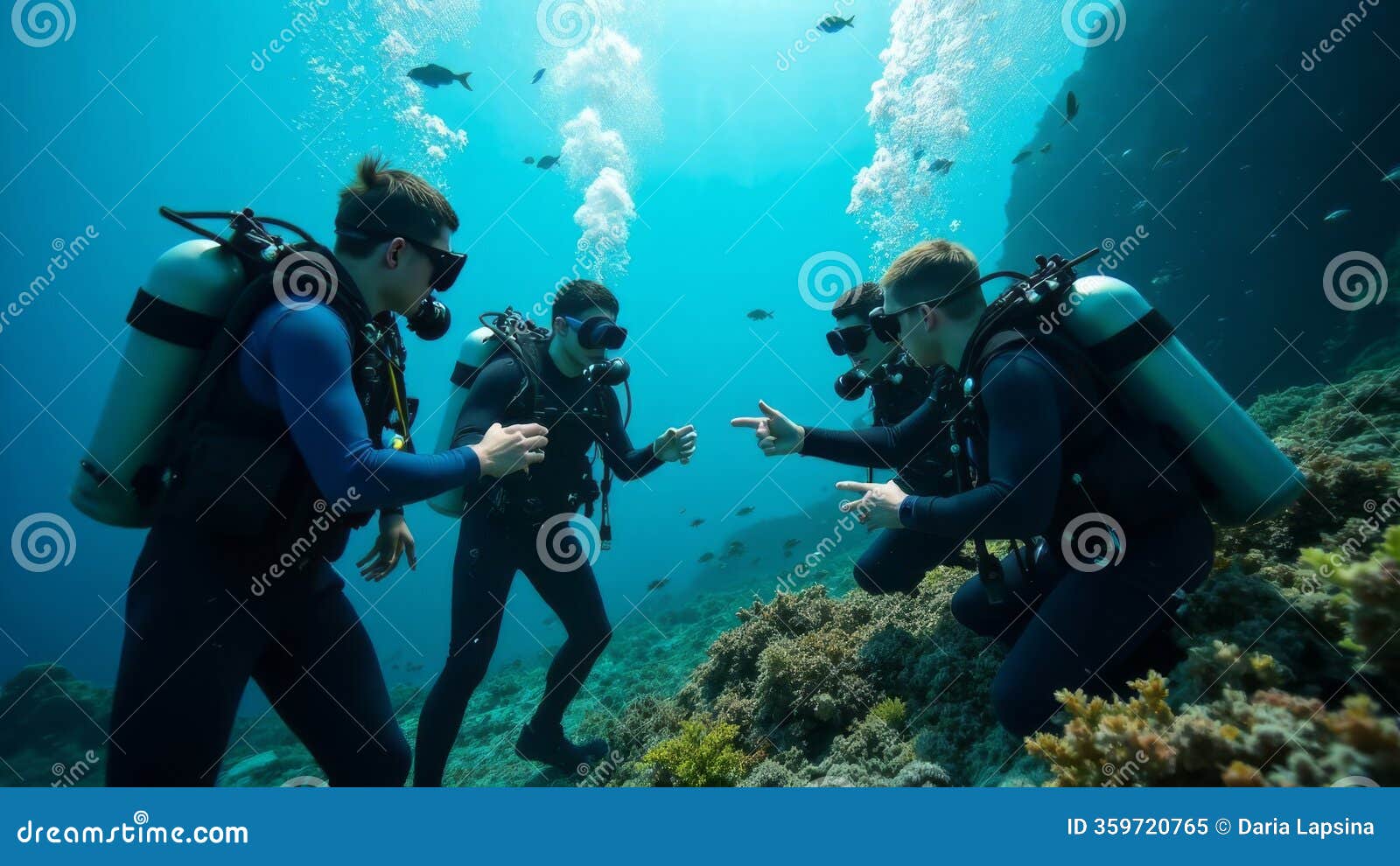 Group of Beginner Divers Trains Underwater with Instructor, Practicing ...