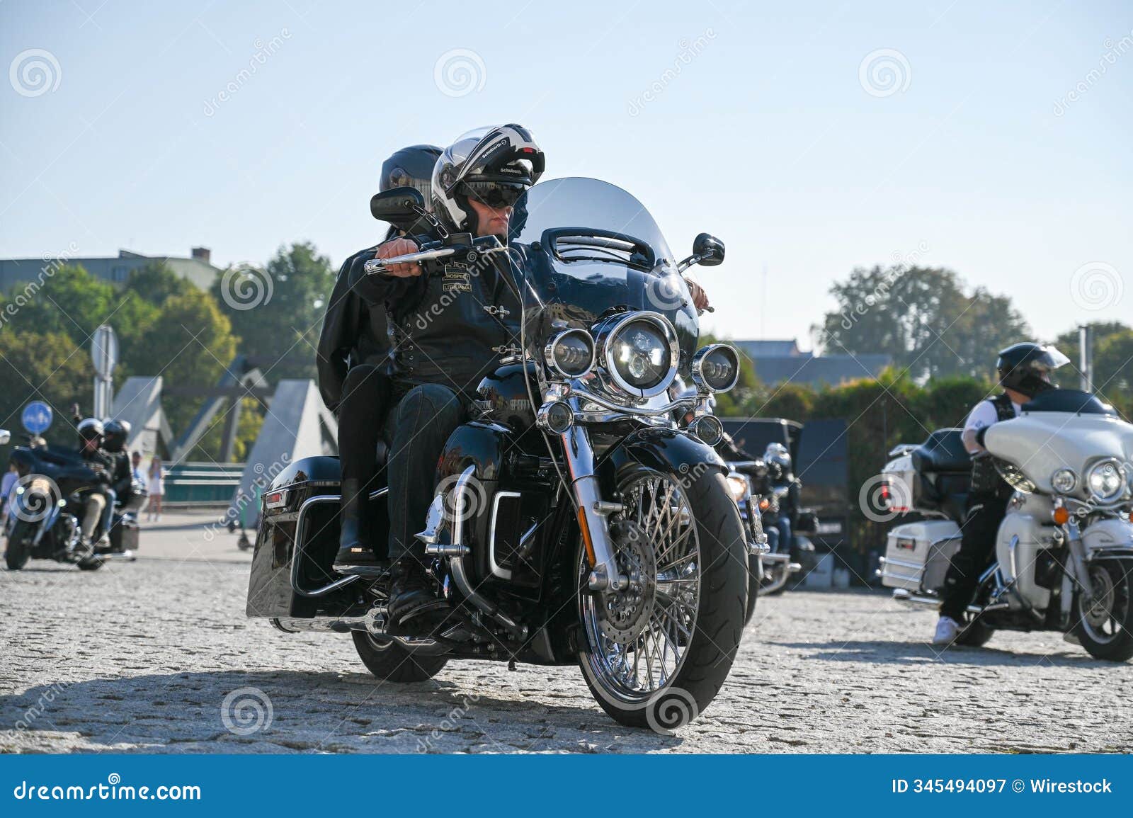 Group of Bikers in the Town Square on a Sunny Day Editorial Photography ...