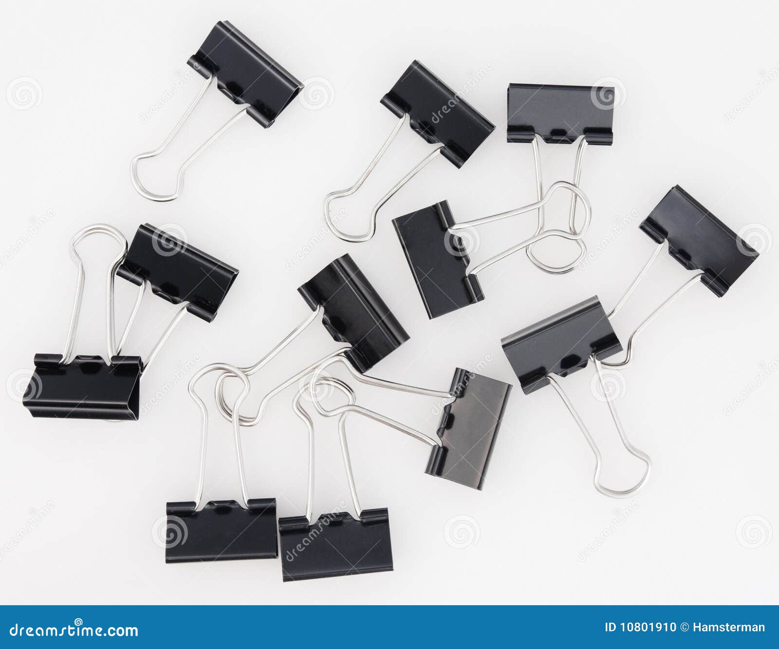 Two Metal Paper Clips In The Form Of Two Checkmarks On A White Paper ...