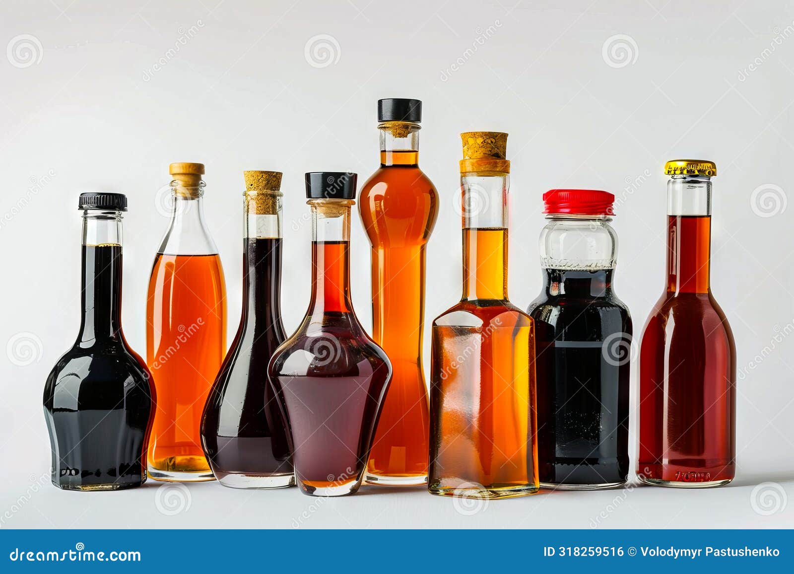A Group of Bottles with Different Types of Syrup Stock Photo - Image of ...