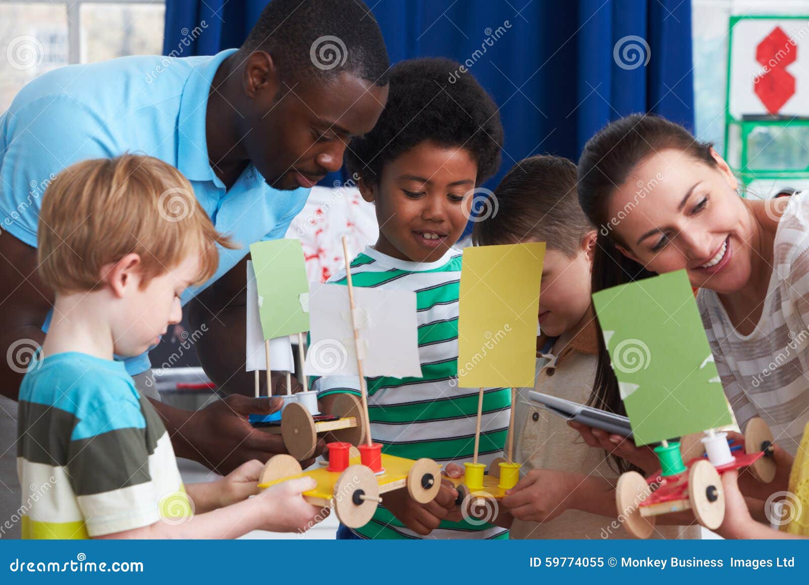 Group of Boys Carrying Out Experiment in Science Class Stock Image ...