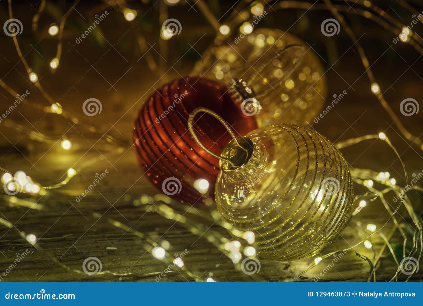 A Group of Bright Festive Balls with Lights on a Colored Background ...