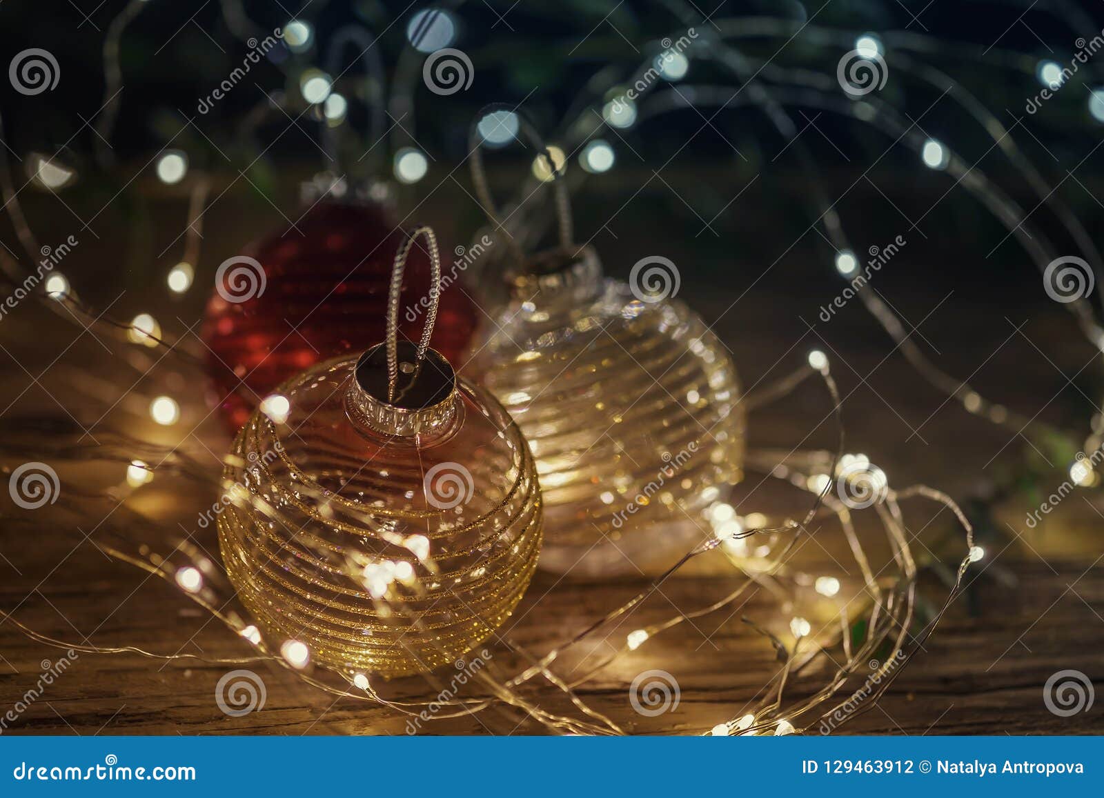 A Group of Bright Festive Balls with Lights on a Dark Background. Soft ...