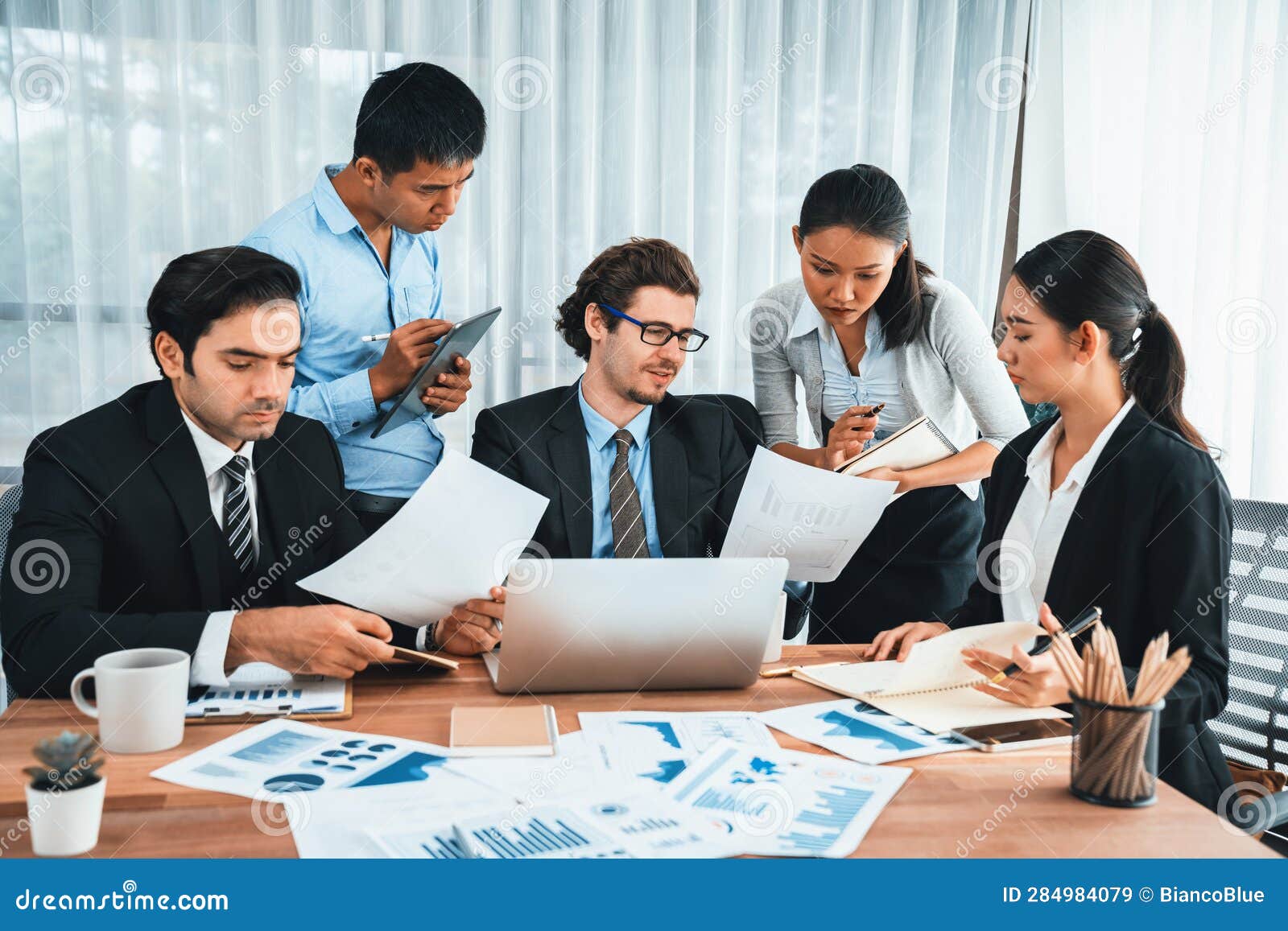 Group of Business Analyst Team Analyzing Financial Data Report ...