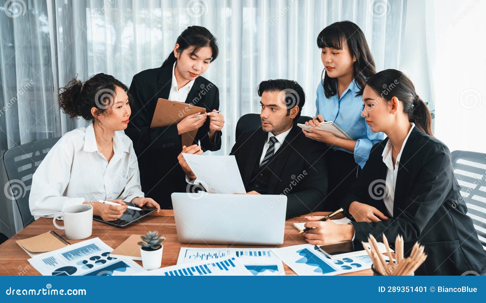 Group of Business Analyst Team Analyzing Financial Data Report ...