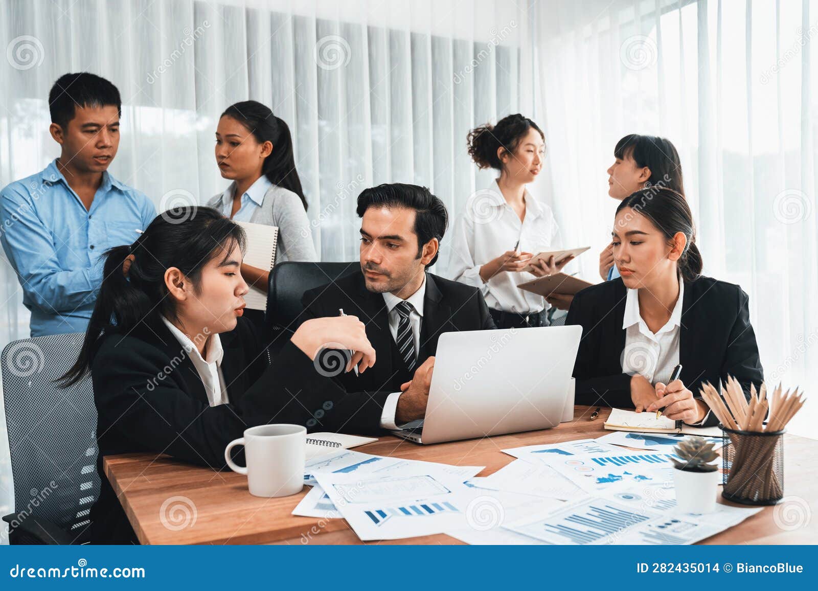 Group of Business Analyst Team Analyzing Financial Data Report ...