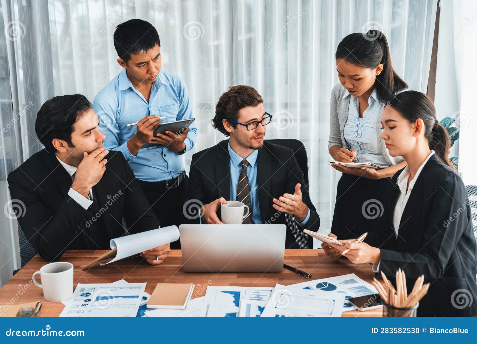 Group of Business Analyst Team Analyzing Financial Data Report ...