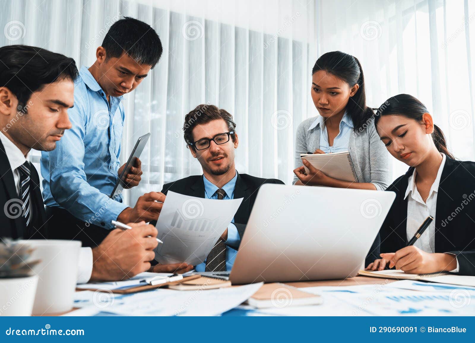 Group of Business Analyst Team Analyzing Financial Data Report ...