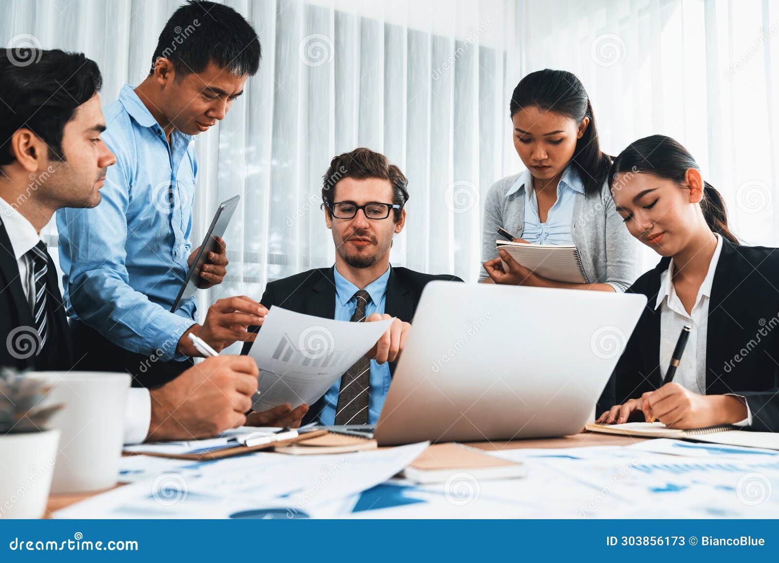 Group of Business Analyst Team Analyzing Financial Data Report ...