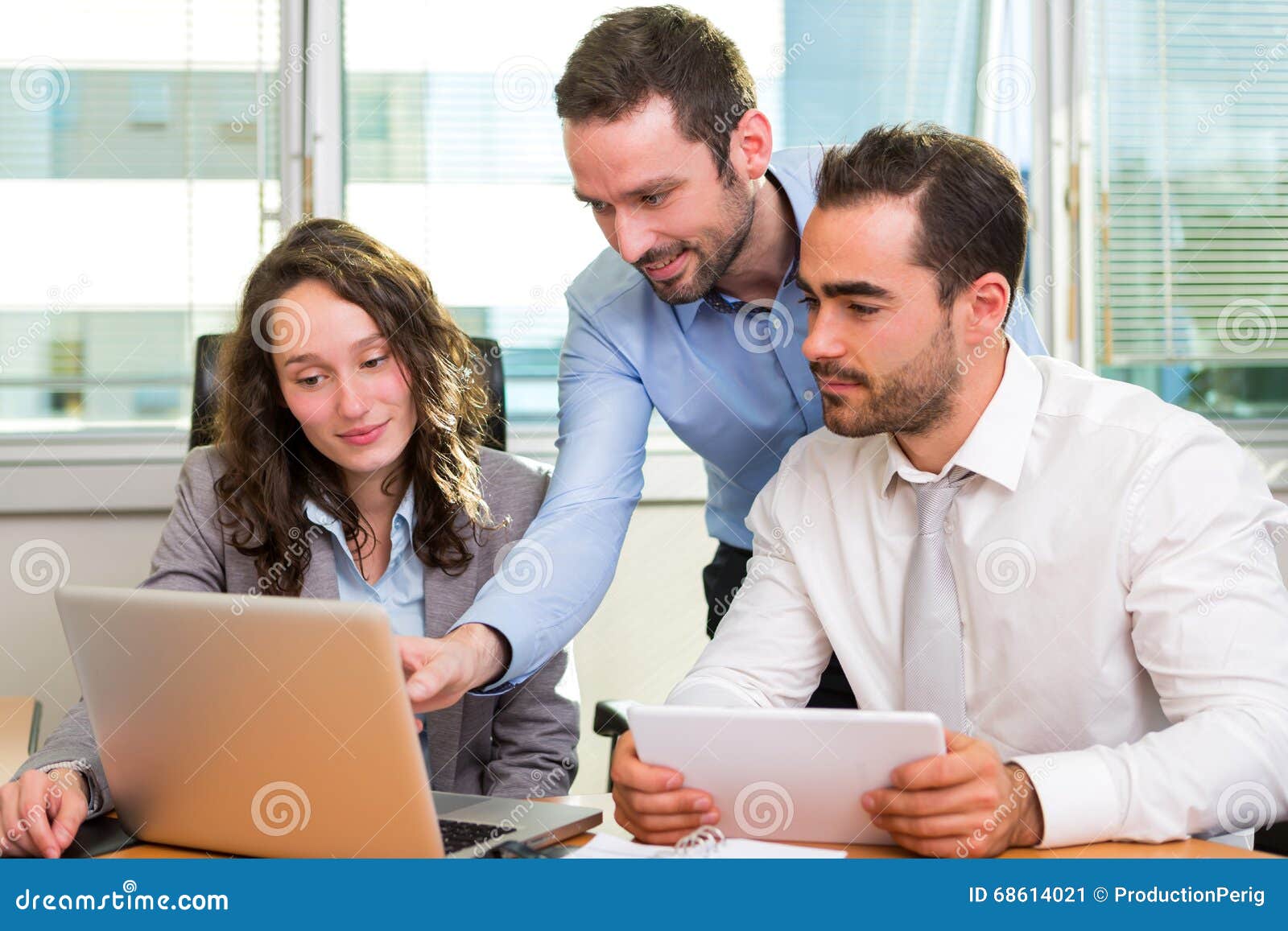 Group of Business Associates Working Together at the Office Stock Image ...