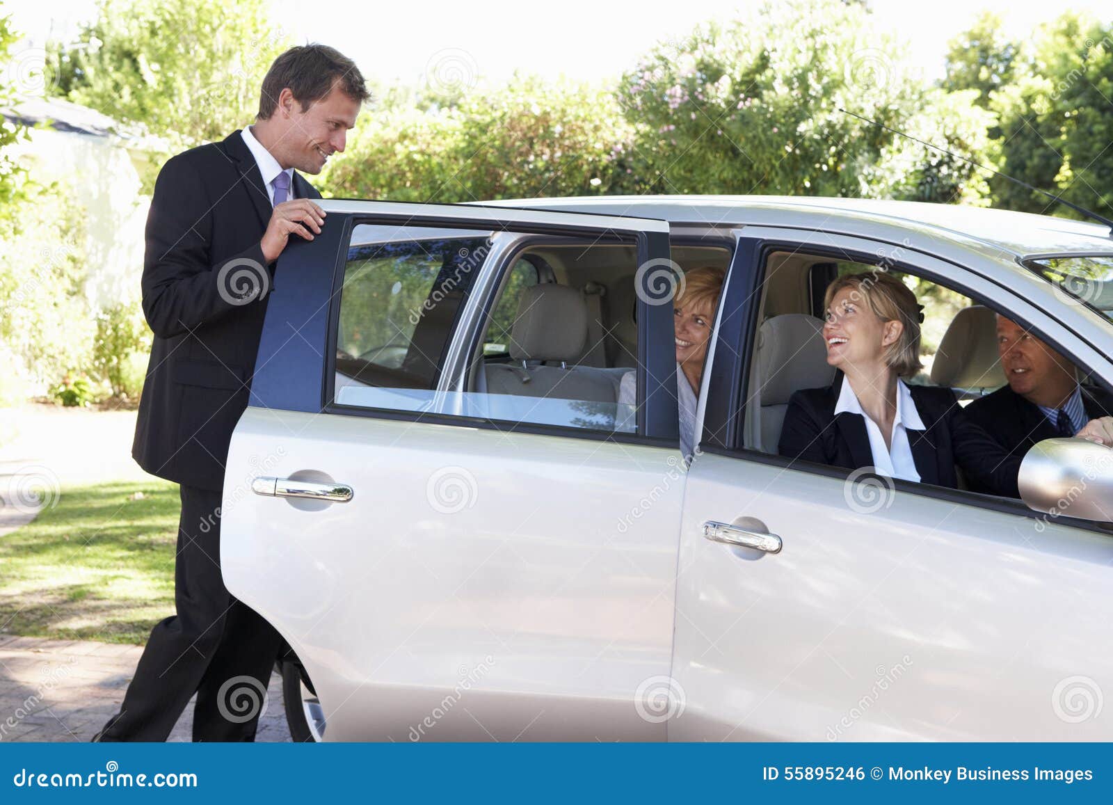 Group of Business Colleagues Car Pooling Journey into Work Stock Photo ...
