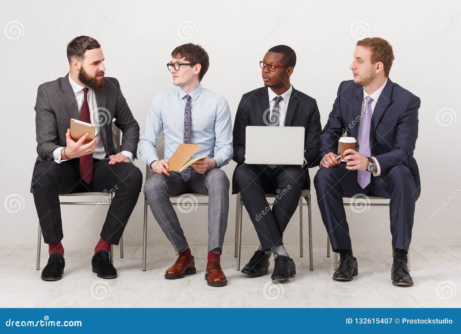 Group of Business Men Sitting on Chairs Stock Image - Image of ...