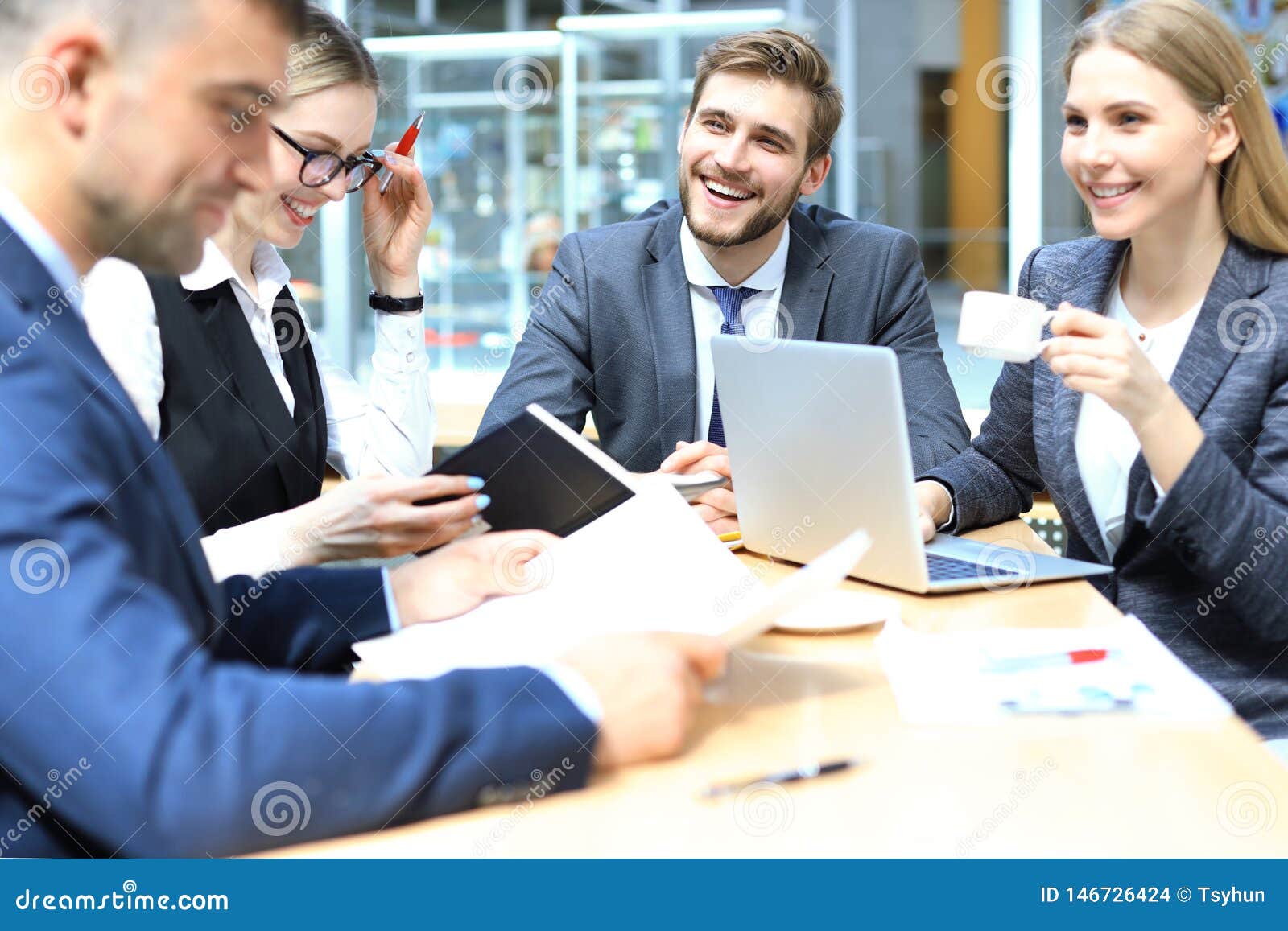 Group of Business Partners Discussing Ideas and Planning Work in Office ...