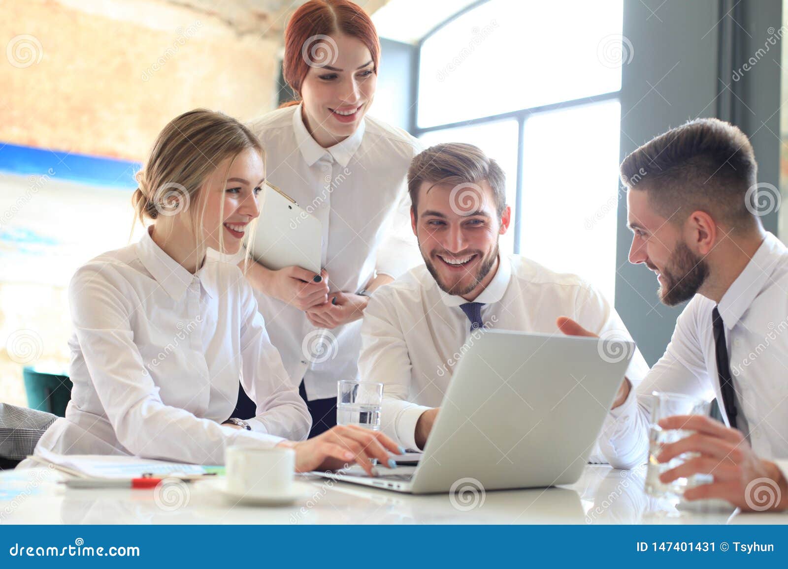 Group of Business Partners Discussing Ideas and Planning Work in Office ...