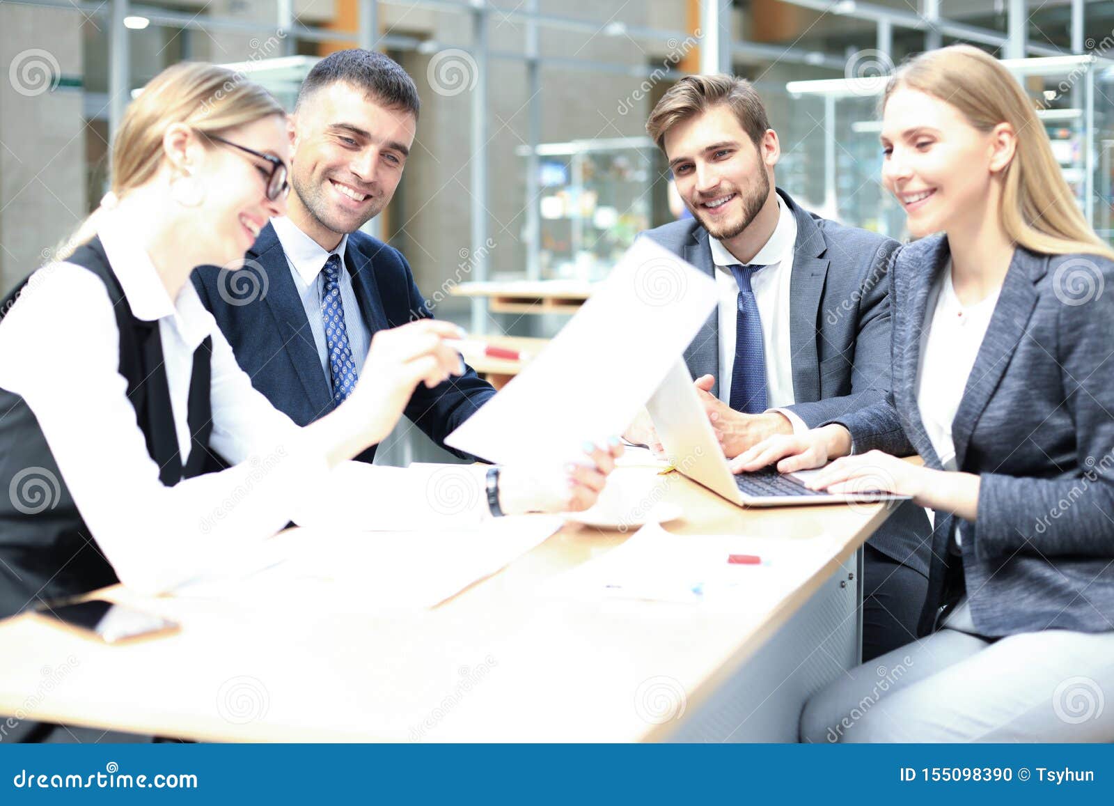 Group of Business Partners Discussing Ideas and Planning Work in Office ...