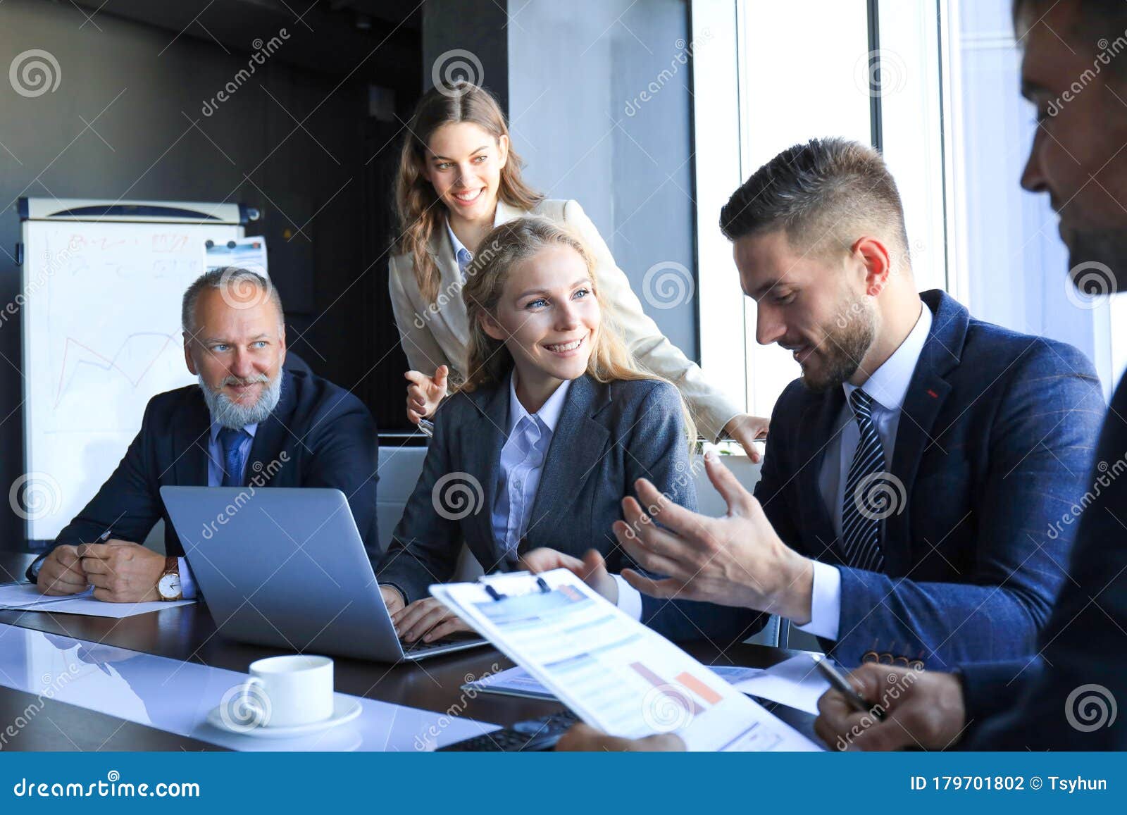 Group of Business Partners Discussing Ideas and Planning Work in Office ...