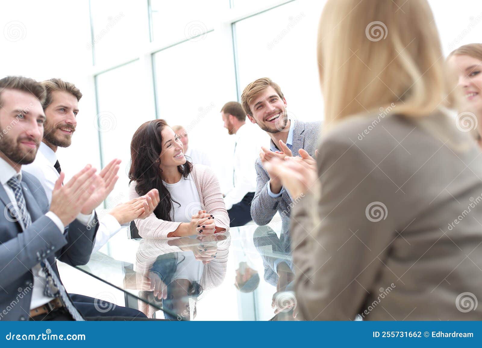 Group of Business People Applauding Sitting at the Negotiating Table ... Group of Business People Applauding Sitting at the Negotiating Table ...
