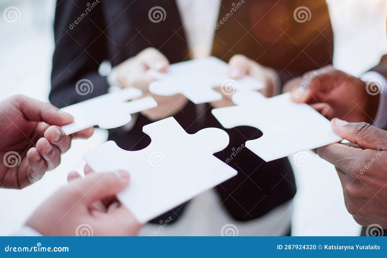 Group of Business People Assembling Jigsaw Puzzle and Represent Team ...