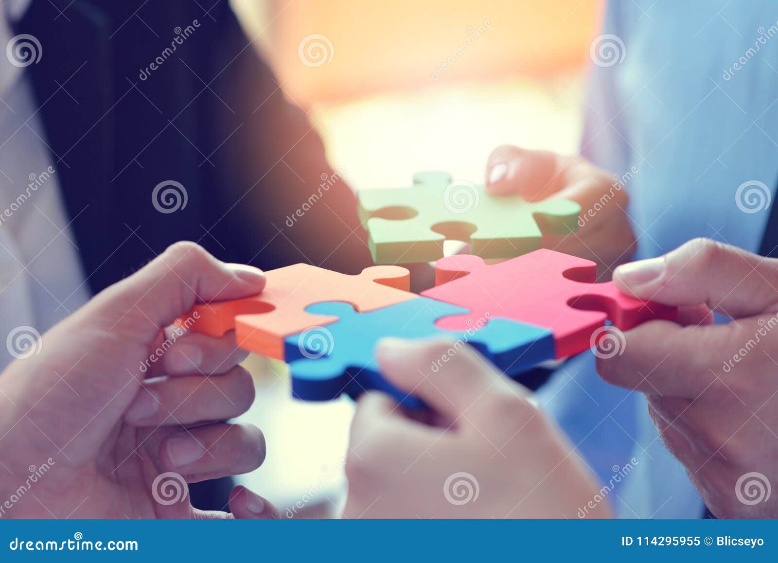 Group of Business People Assembling Jigsaw Puzzle and Represent Stock ...