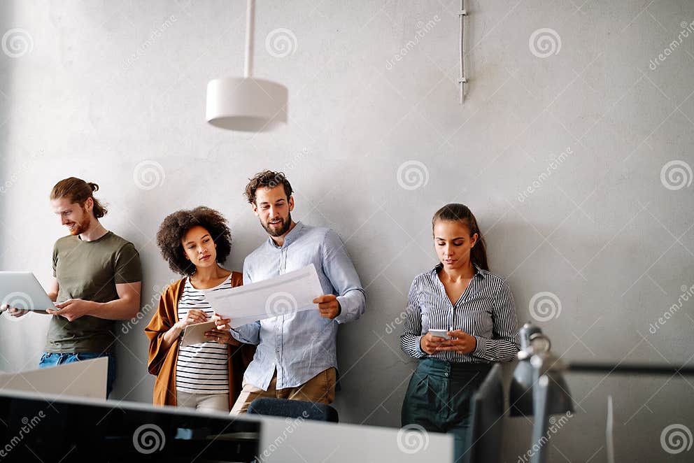 Group of Business People Collaborating on Project in Office Stock Image ...