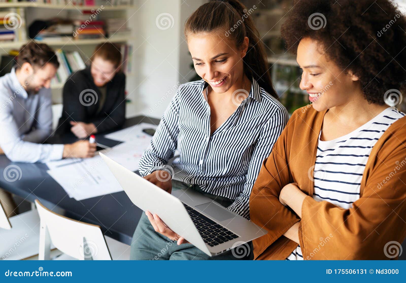 Group of Business People Collaborating on Project in Office Stock Image ...