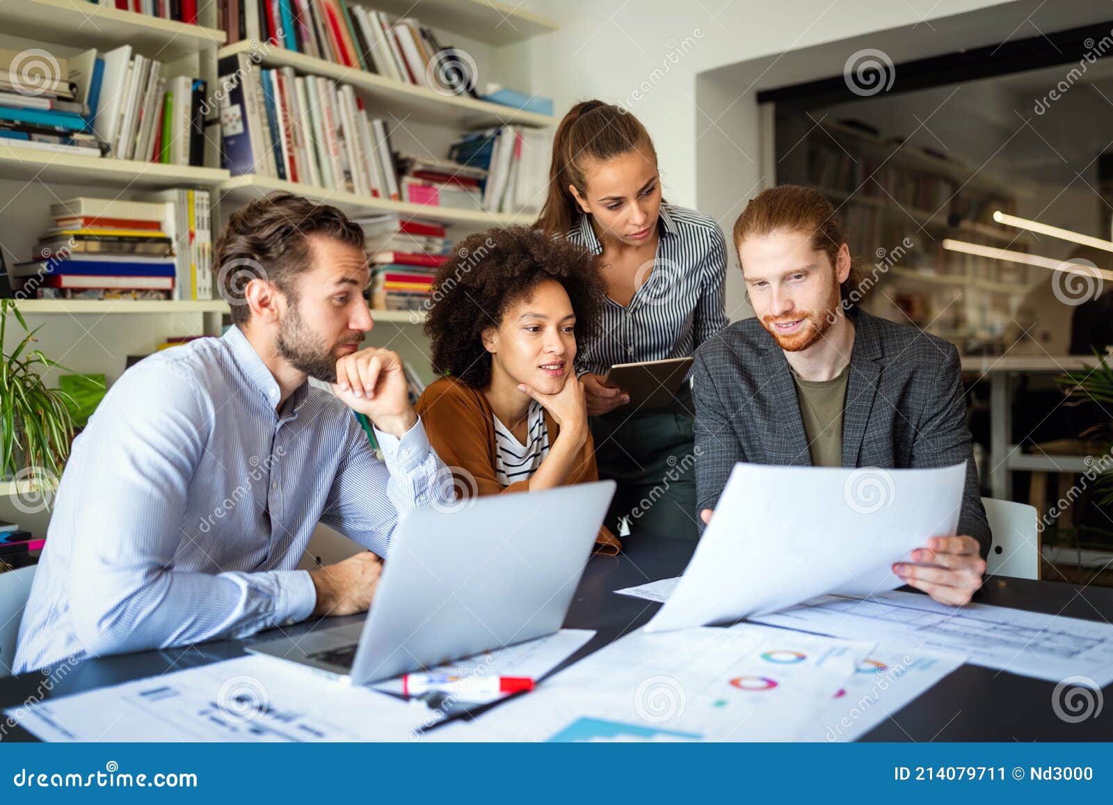 Group of Business People Collaborating on Project in Office Stock Image ...
