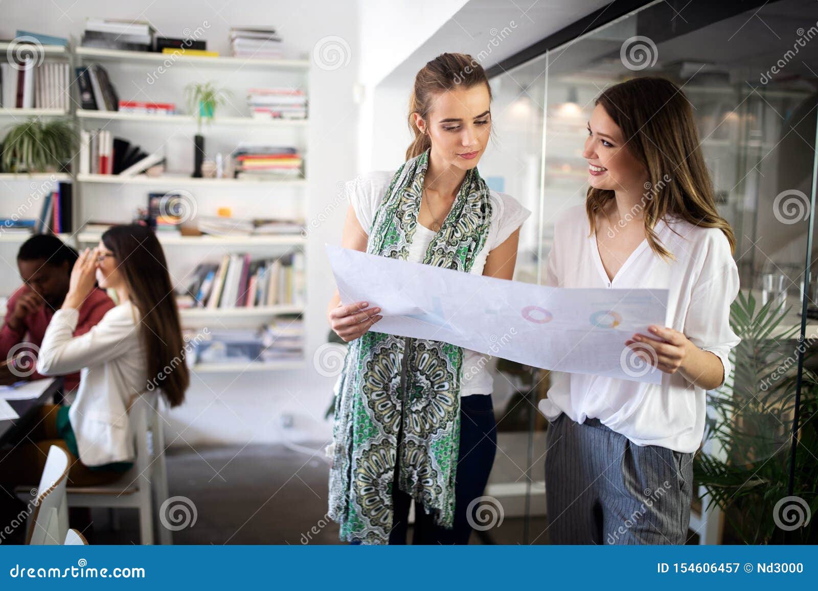 Group of Business People Collaborating on Project in Office Stock Image ...