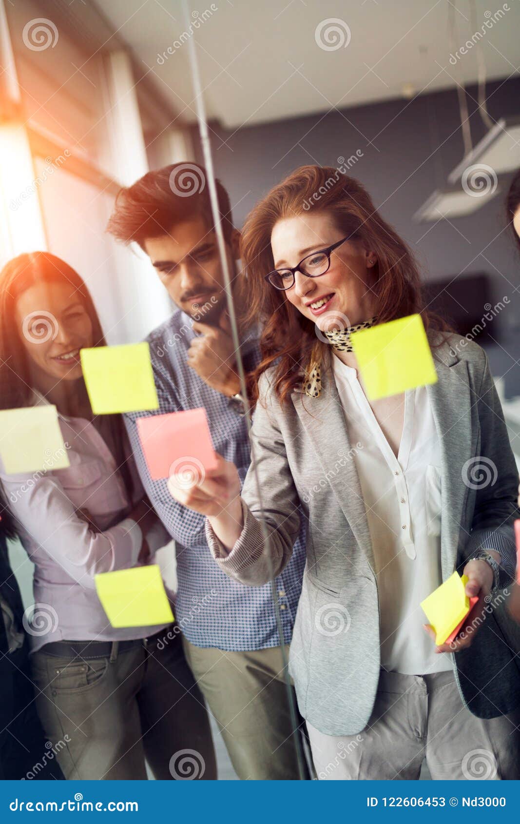 Group of Business People Collaborating and Working on Project Stock ...