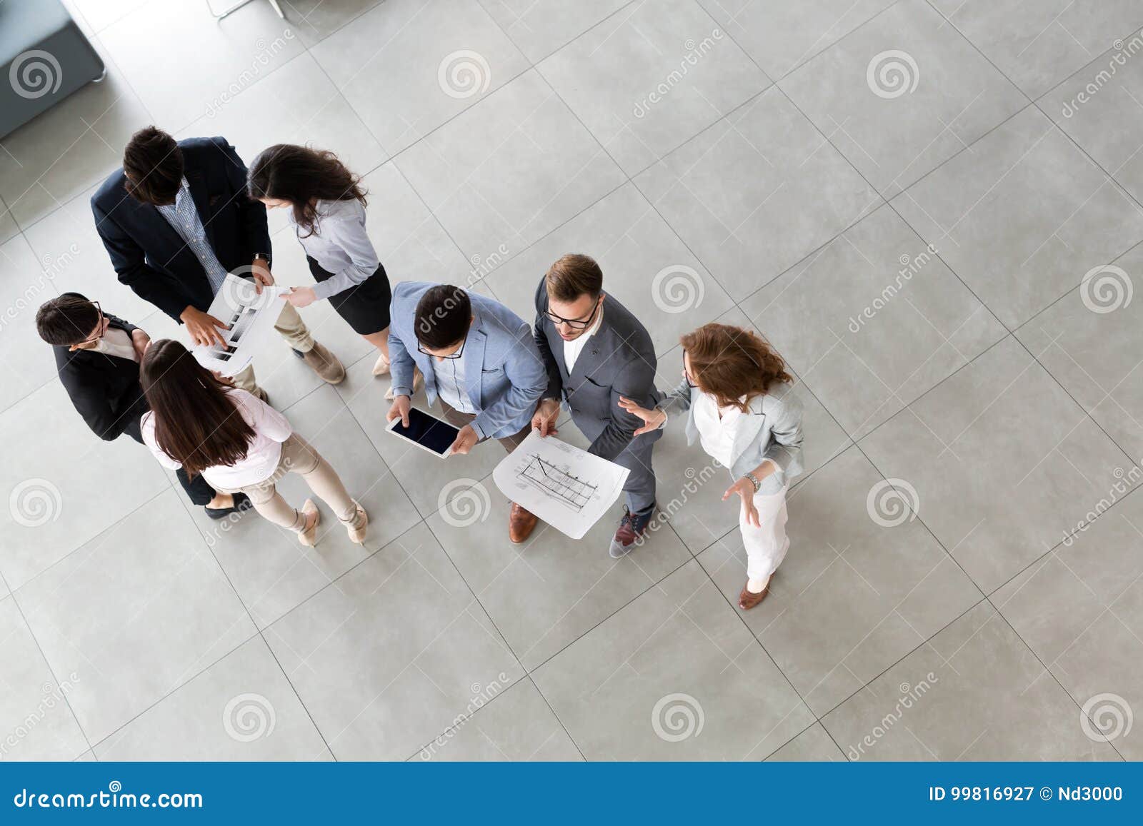 Group of Business People Collaborating and Working on Project Stock ...