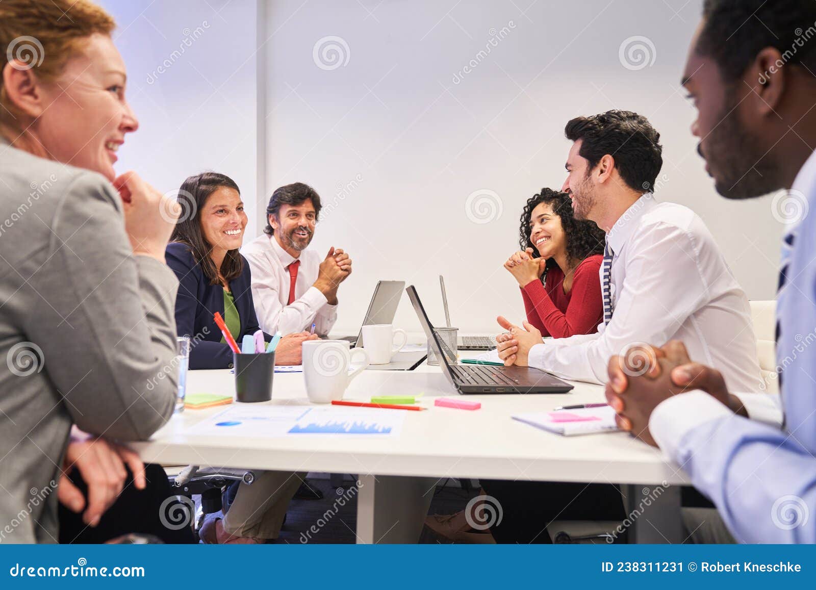 Group of Business People at the Conference Table in a Meeting Stock ...