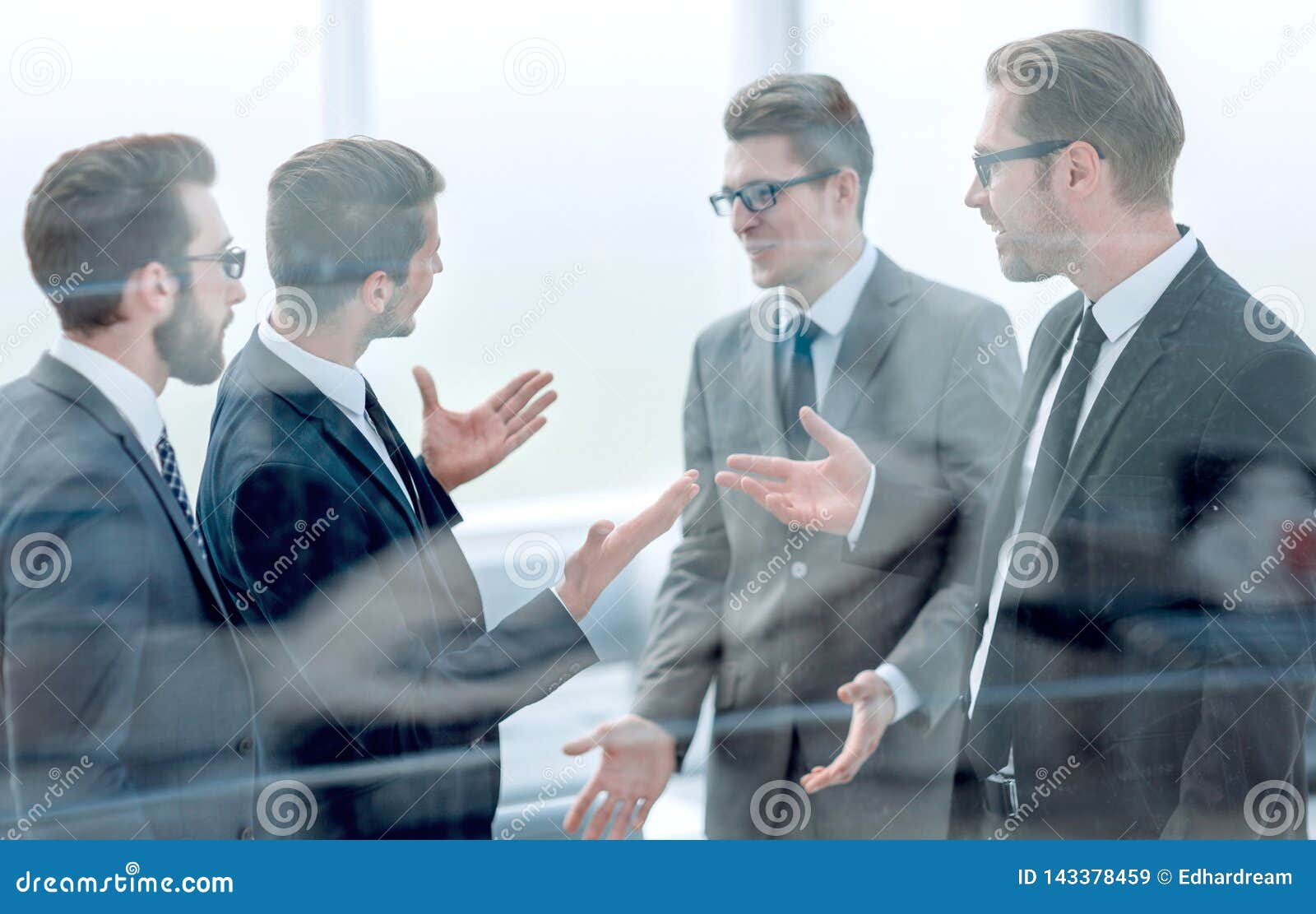 Group of Business People Discussing Common Interests in the Office ...