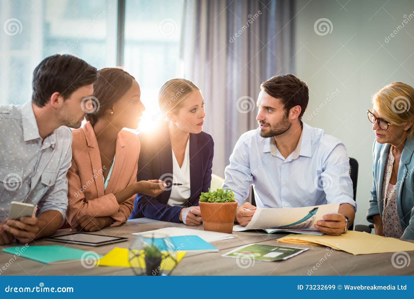 Group of Business People Discussing at Desk Stock Image - Image of ...