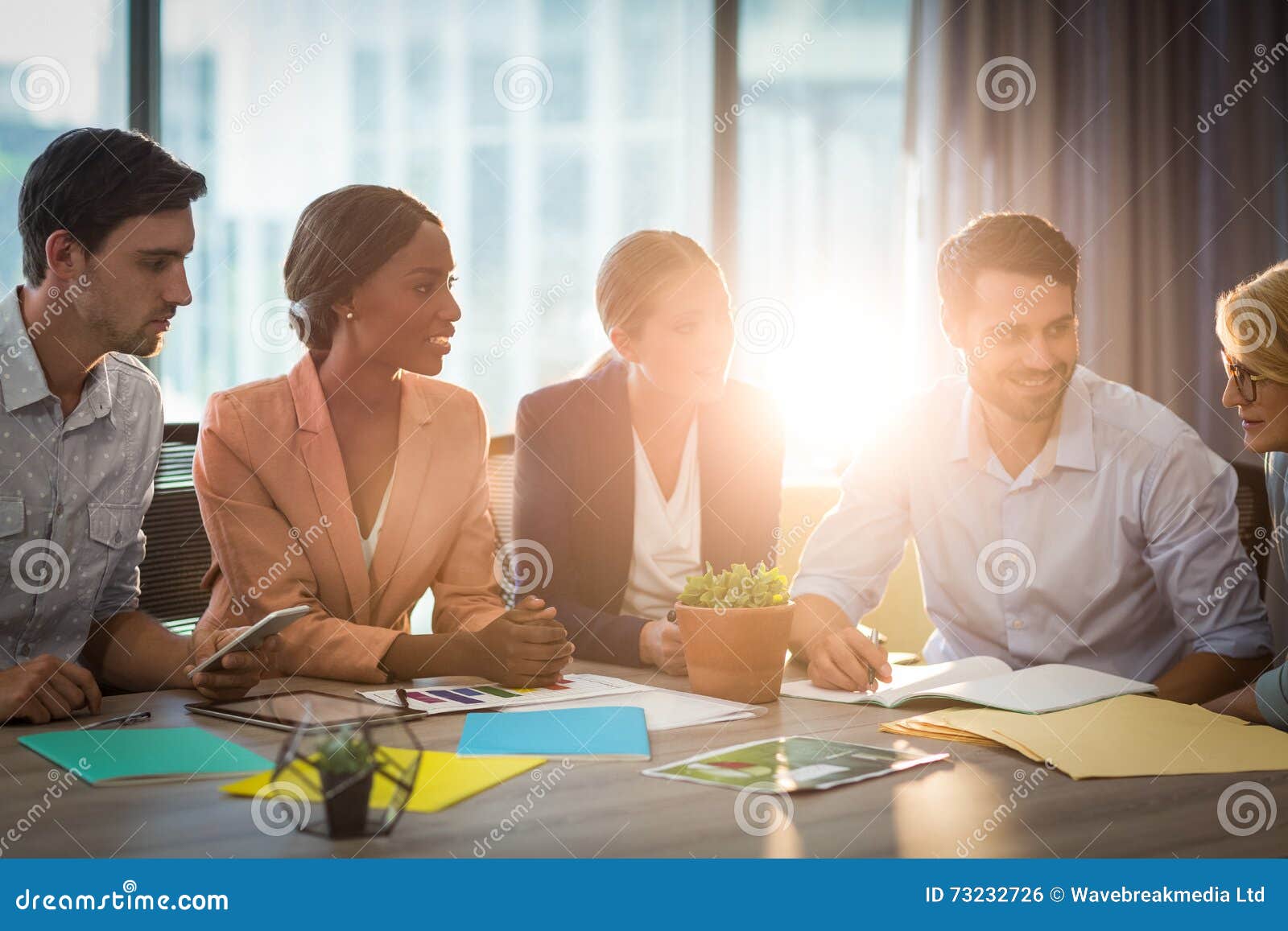 Group of Business People Discussing at Desk Stock Photo - Image of ...