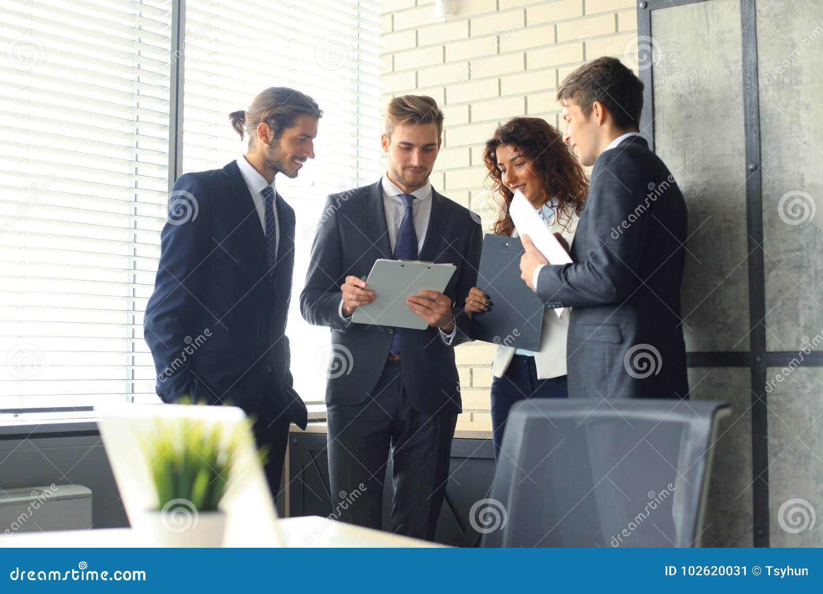 Group of Business People Discussing Ideas at Meeting. Stock Image ...