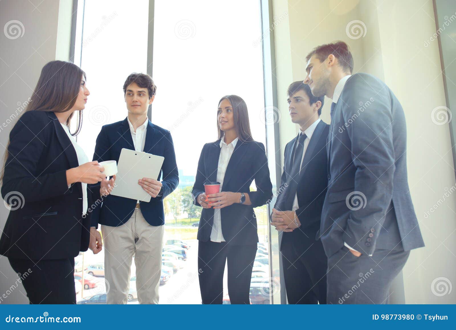 Group of Business People Discussing Ideas at Meeting. Stock Photo ...