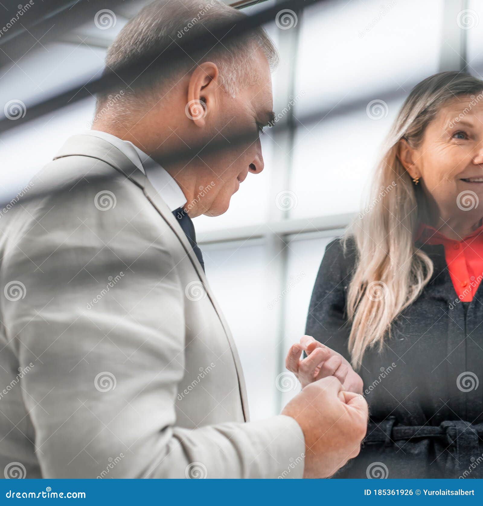 Group of Business People Discussing Something Standing in the Office ...