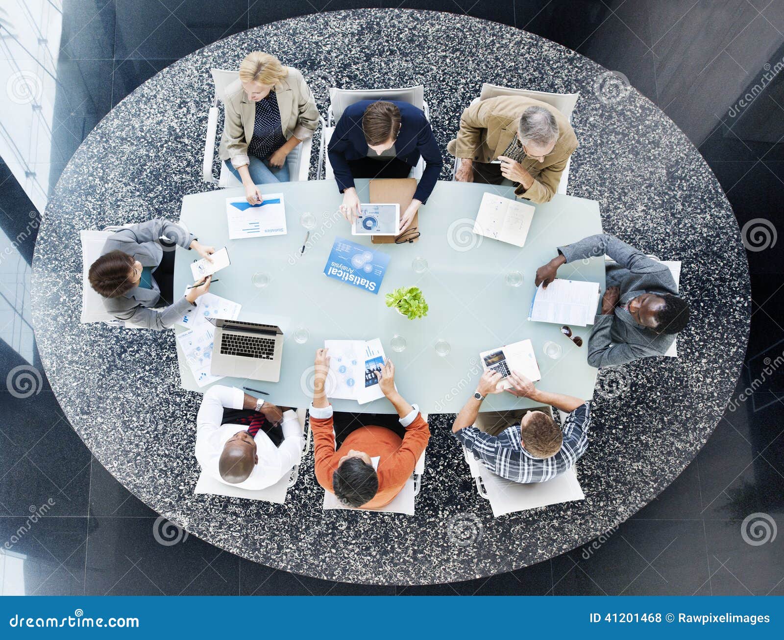Group of Business People Discussing Statistical Analysis Stock Photo ...