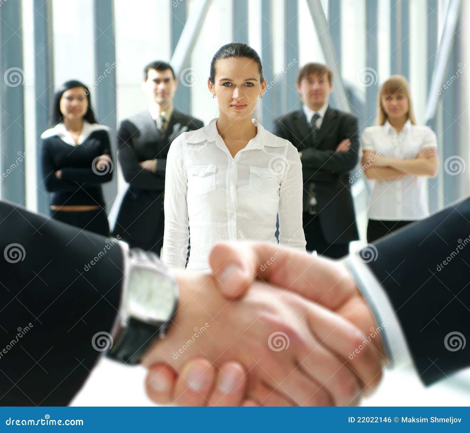 Group of Business People and a Handshake Stock Photo - Image of ...