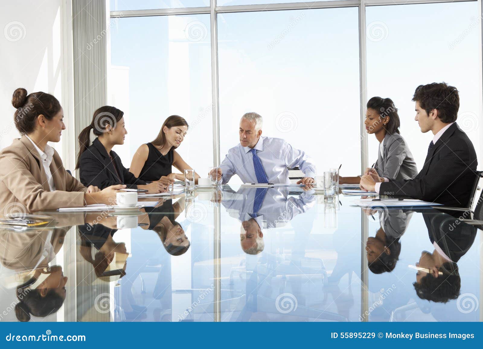 Group of Business People Having Board Meeting Around Glass Table Stock ...