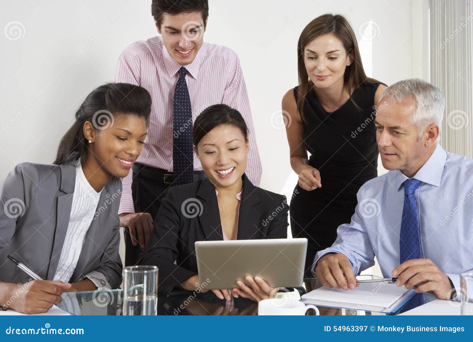 Group of Business People Having Meeting Around Tablet Computer a Stock ...