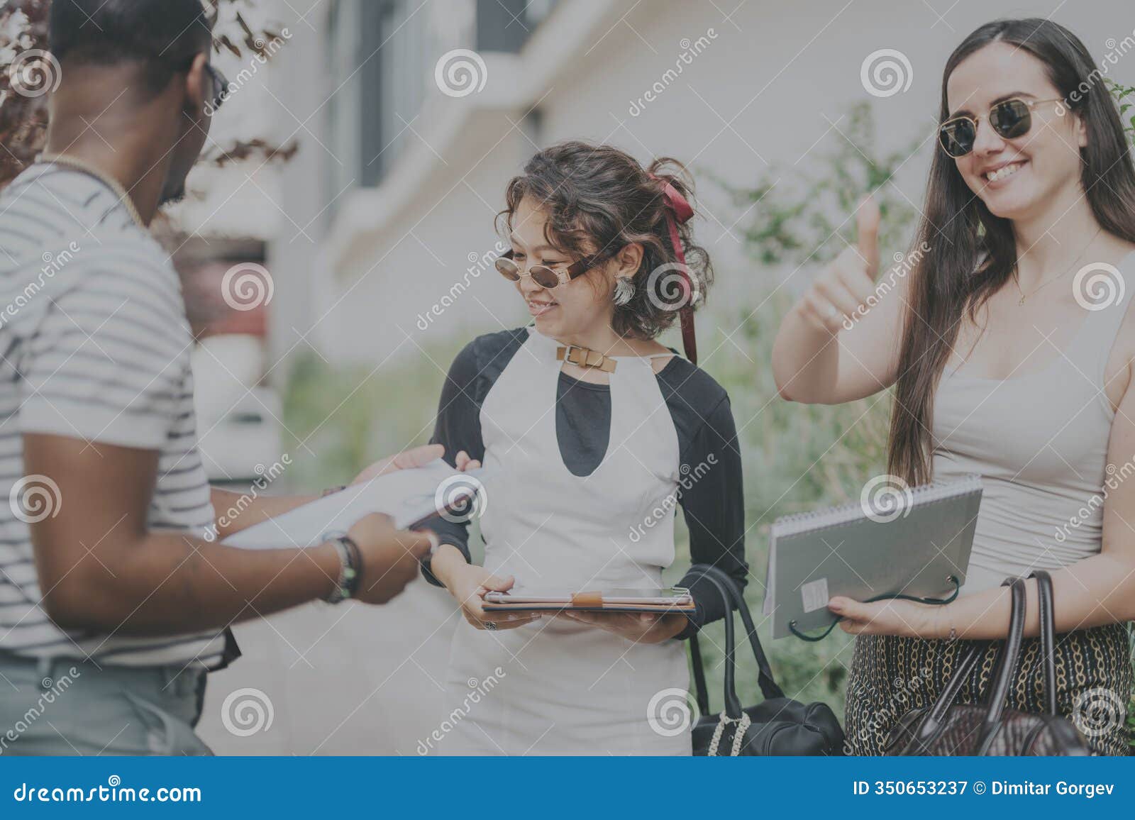 Business People Discussing Ideas Outdoors with Enthusiasm Stock Image ...