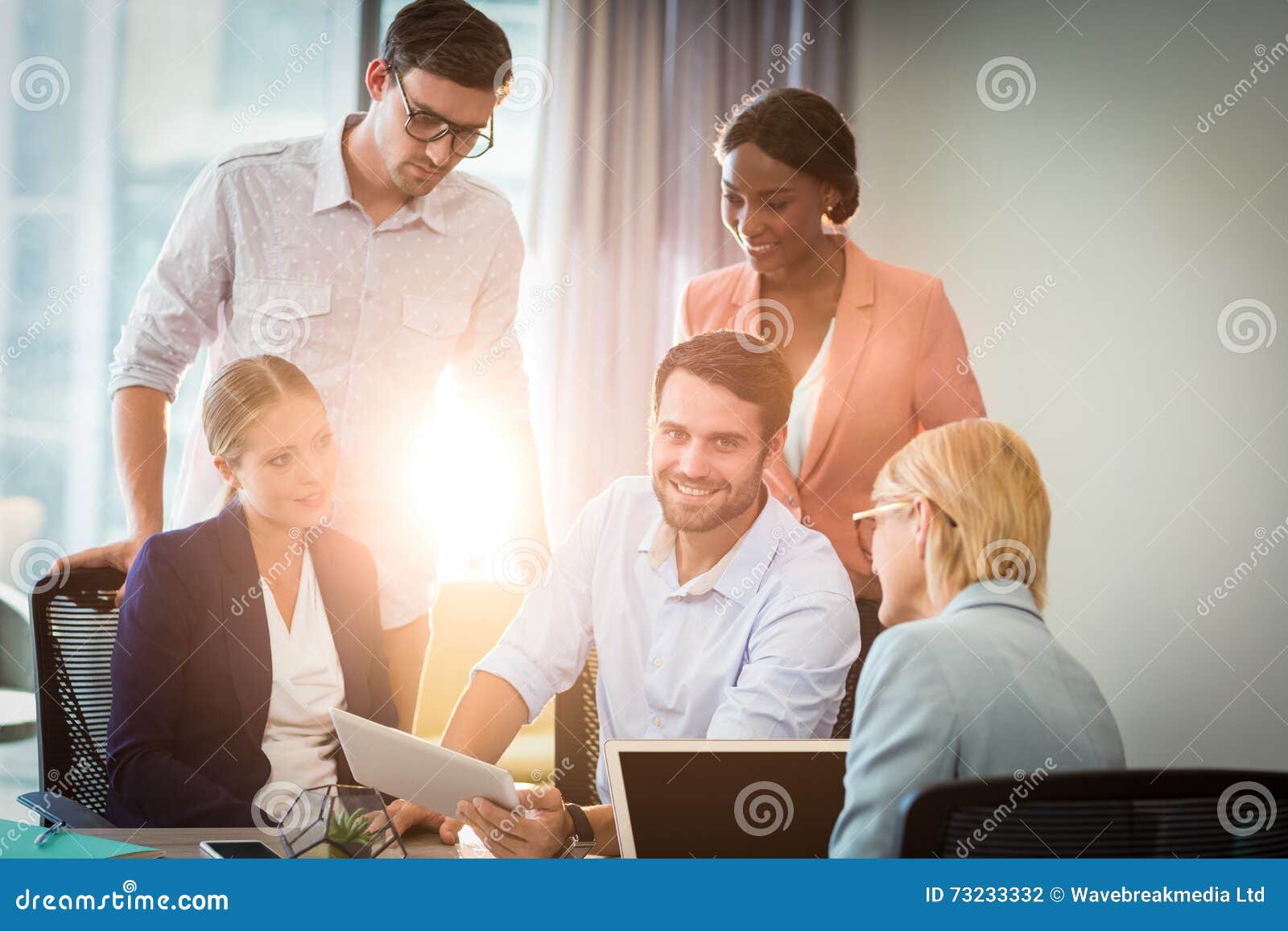 Group of Business People Interacting Using Digital Tablet Stock Photo ...