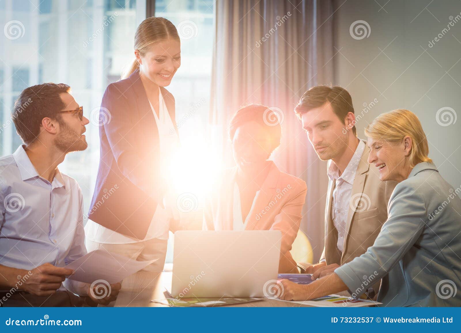 Group of Business People Interacting Using Laptop Stock Image - Image ...